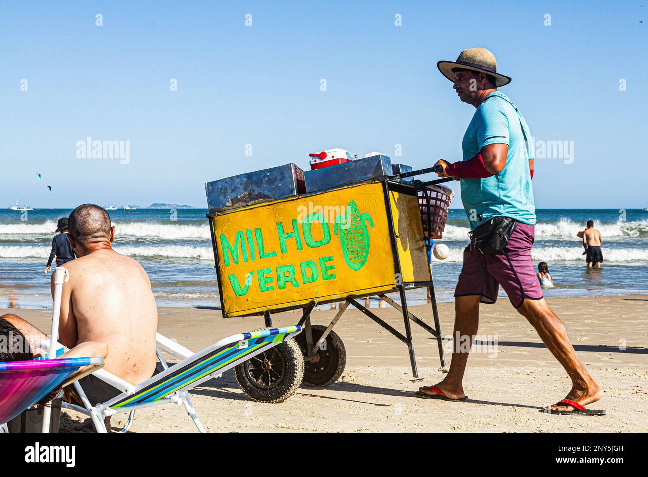A beach vendor seen at Acores Beach in Florianopolis. Beach vendor is a ...