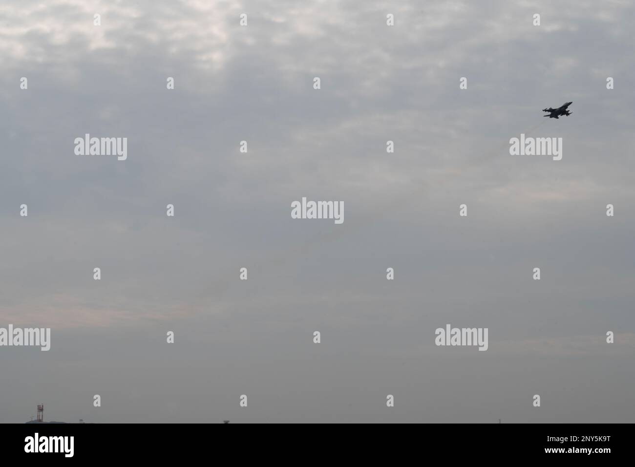 A 35th Fighter Squadron (FS) F-16 Fighting Falcon flies during a ...