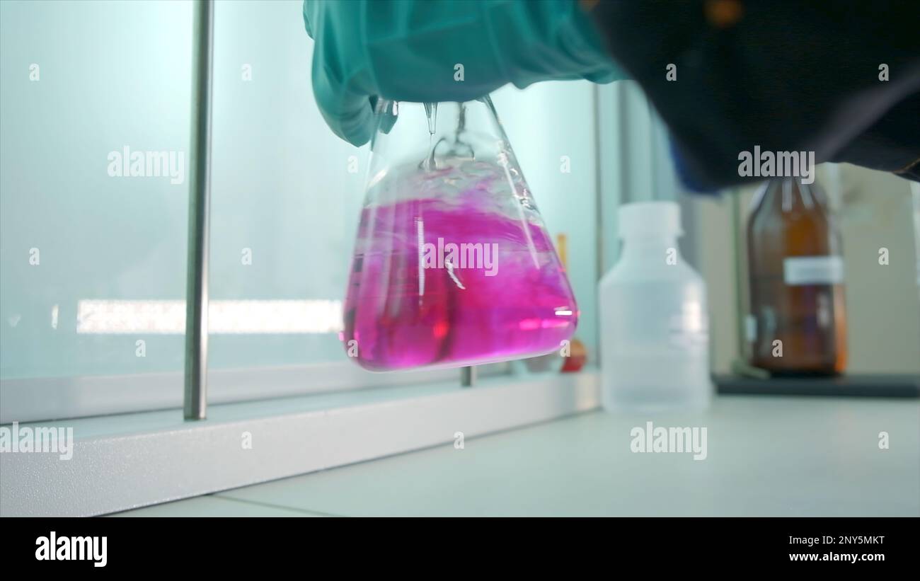 Transparent flask water in process hi-res stock photography and images ...