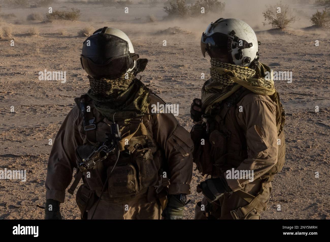 U.S. Marine Corps Cpl. Scott G. Duncan, left, a crew chief with Marine ...