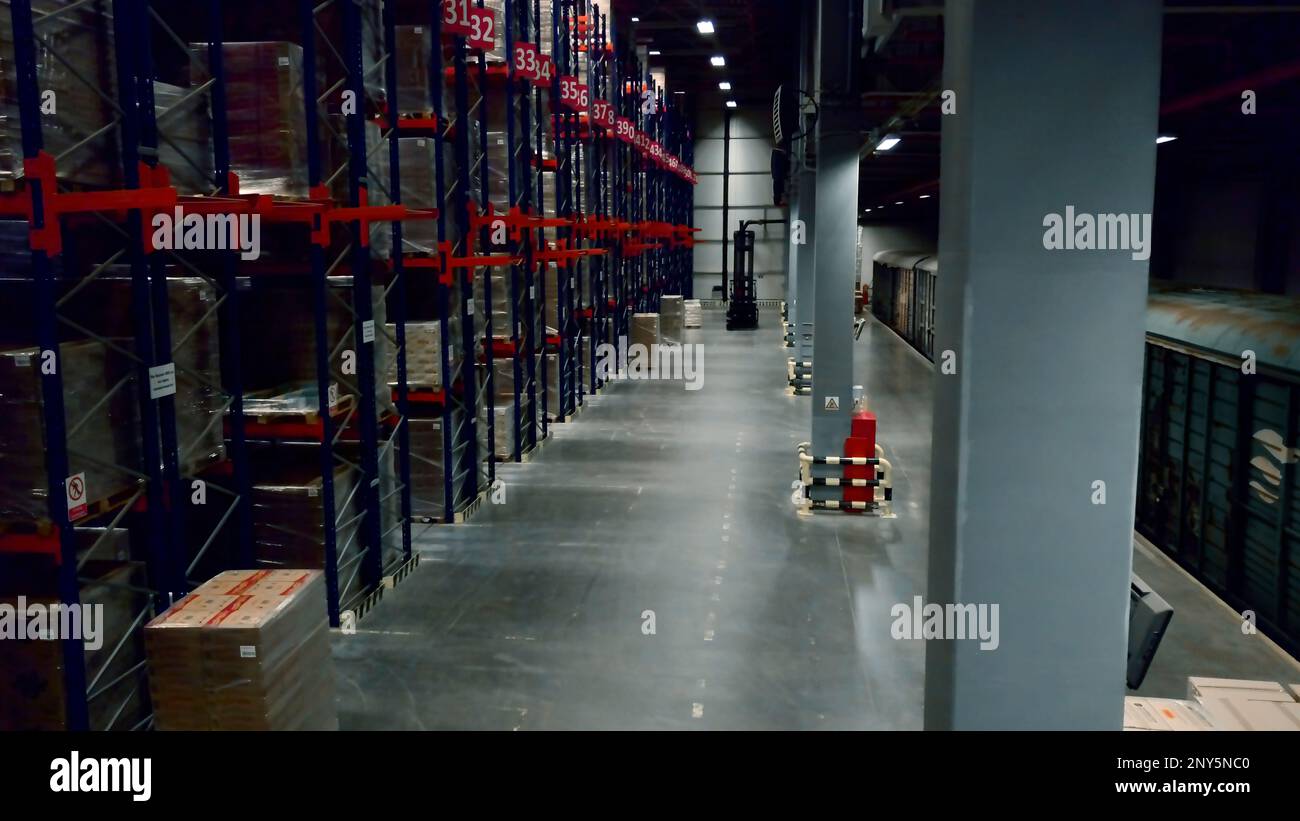 Busy work. Creative. A large warehouse room where visiting trains ...