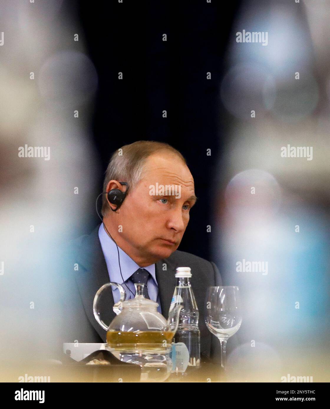 Russia's President Vladimir Putin attends a meeting with heads of ...
