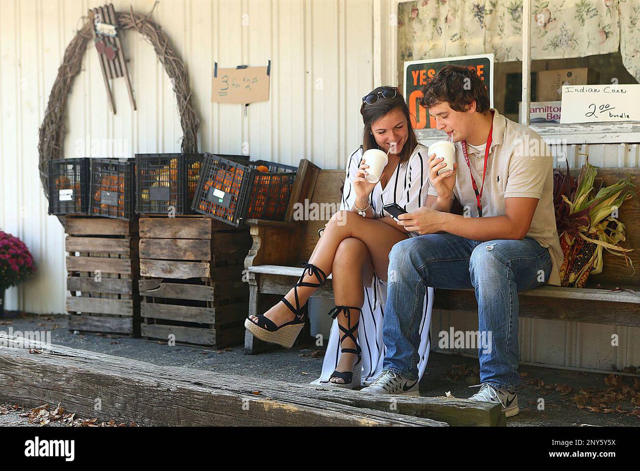 Western High School students Merha Buck, left, and Andrew Ault, sip on ...