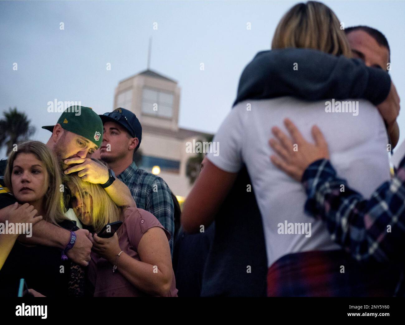 Ryan Poe, second from left, attended the Route 91 Harvest Festival in ...