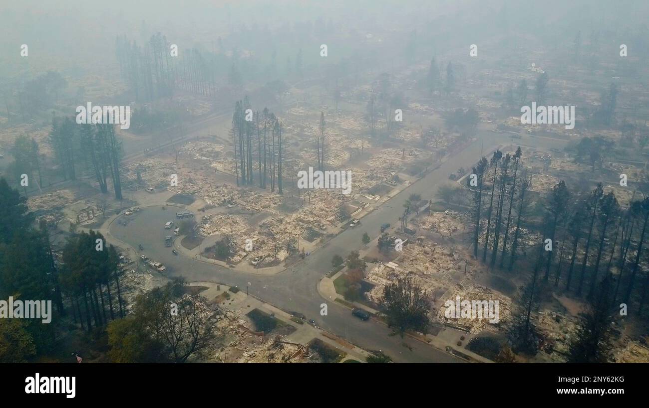 This aerial image shows a neighborhood that was destroyed by a wildfire ...