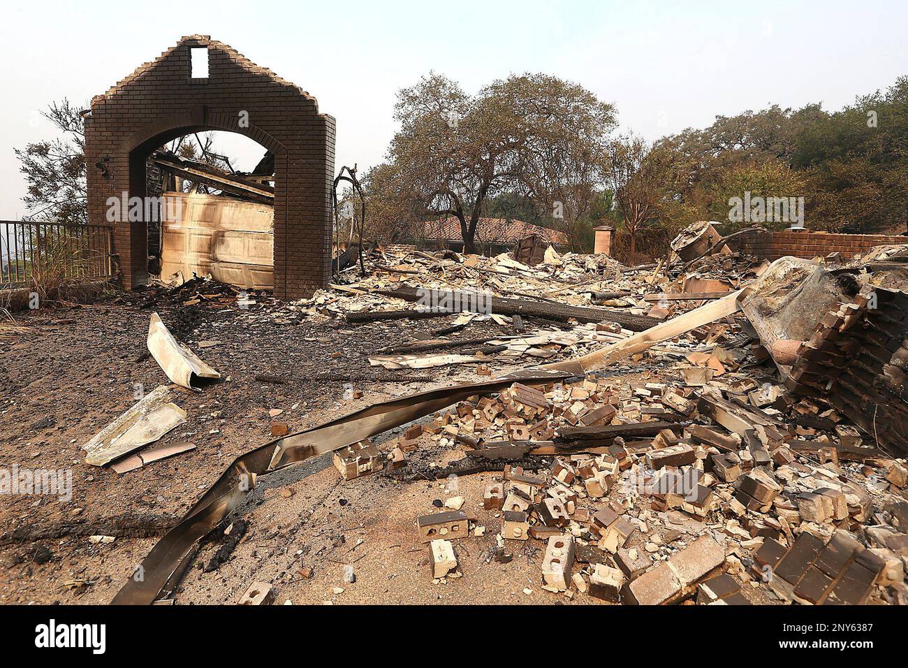 One of the many destroyed homes damaged by the Atlas Fire is seen at ...