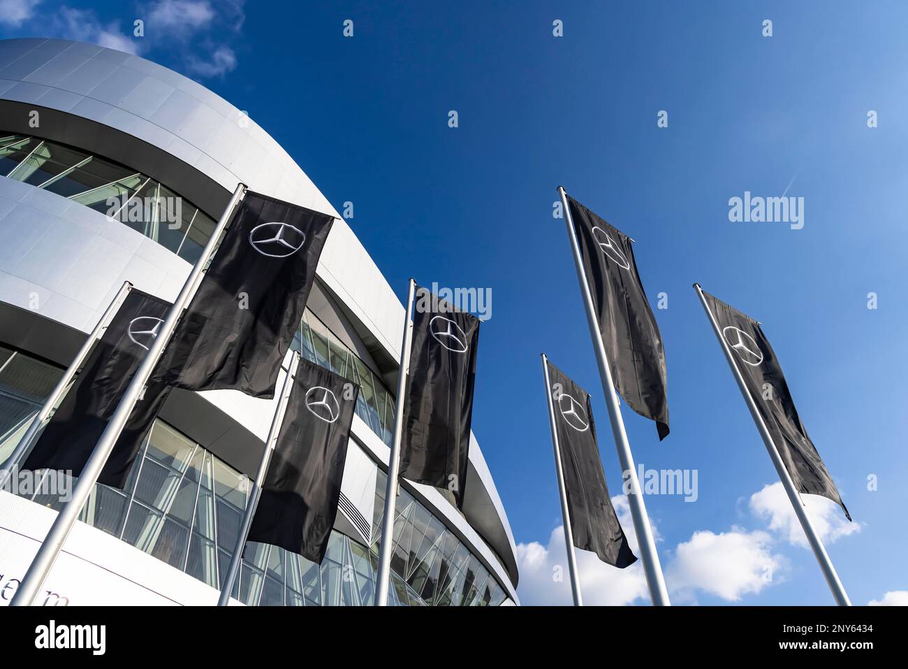 Mercedes Benz Museum Stuttgart, in front of it black flags with the ...
