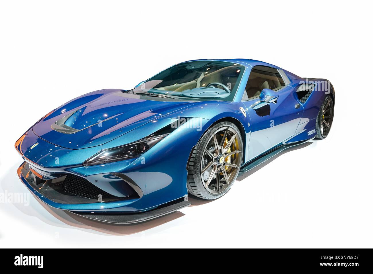 Blue Ferrari f8 tributo spider on white background Stock Photo - Alamy