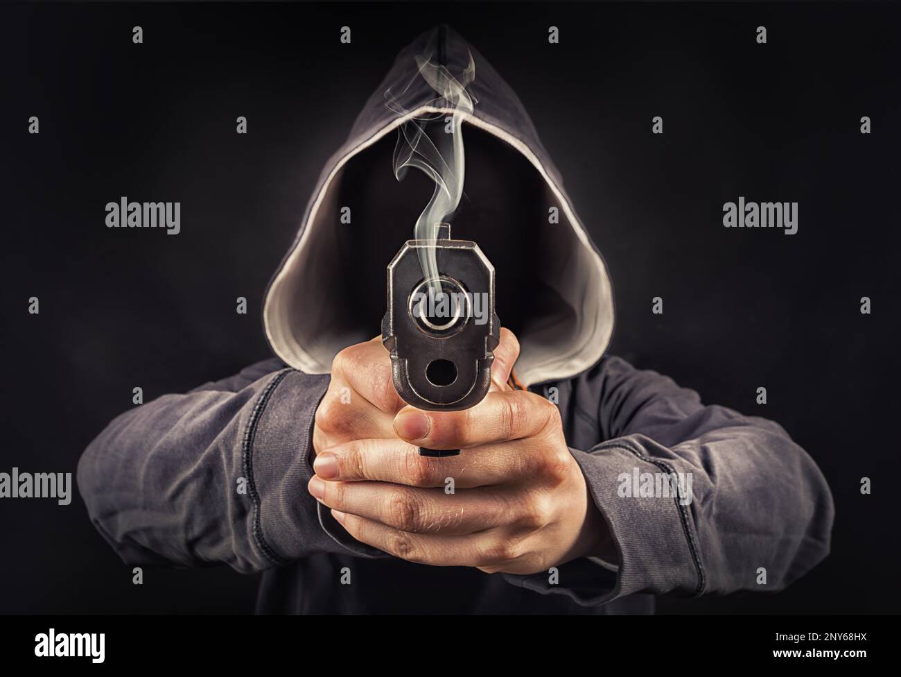 Anonymous person with pistol hi-res stock photography and images - Alamy