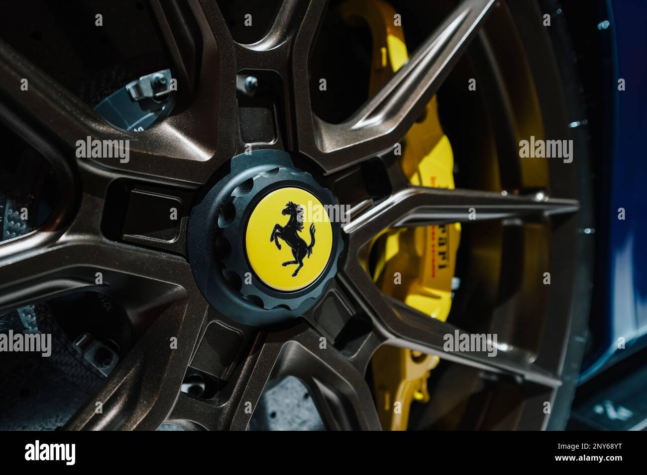 Blue Ferrari f8 tributo spider wheel rim closeup Stock Photo - Alamy