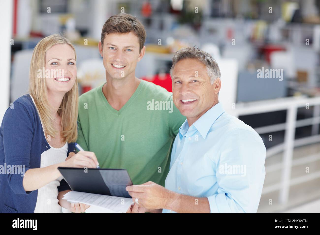 Loving working together as a team. Portrait of a team of office workers ...