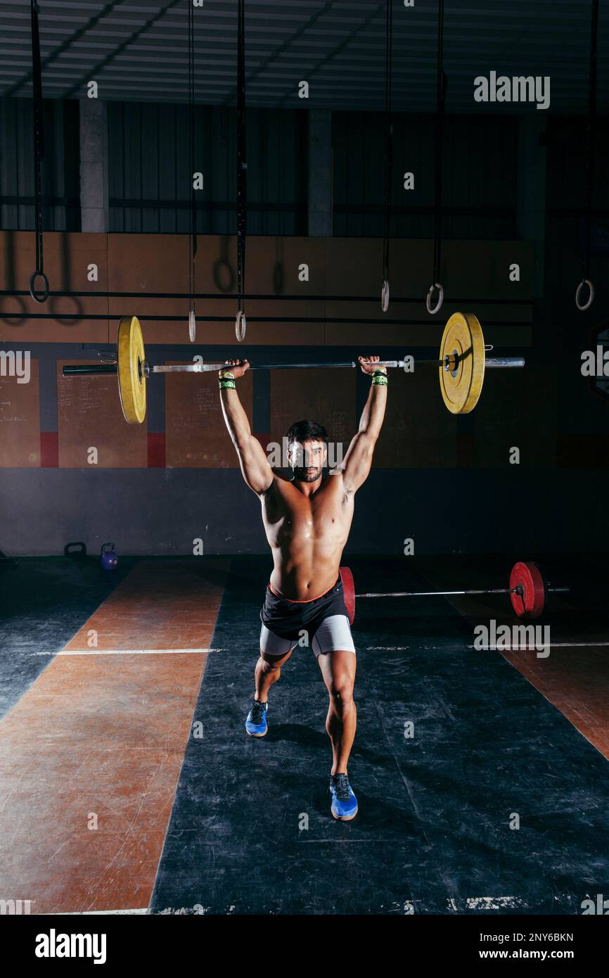 Lifting up guy hi-res stock photography and images - Alamy