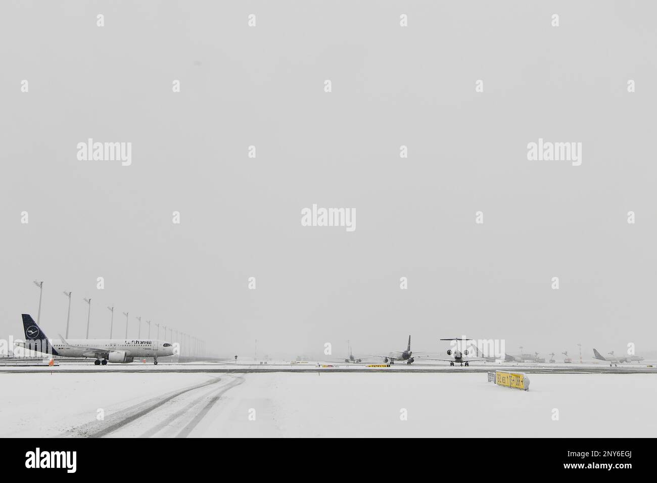 Aircraft in wait for de-icing and take-off clearance in winter snow ...