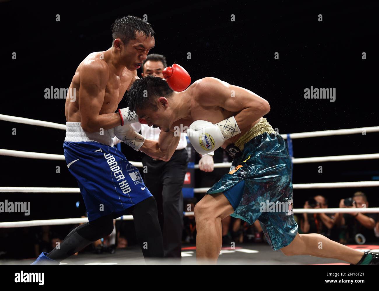 Rex Tso Sing-yu of Hong Kong, left, competes against Kohei Kono of ...
