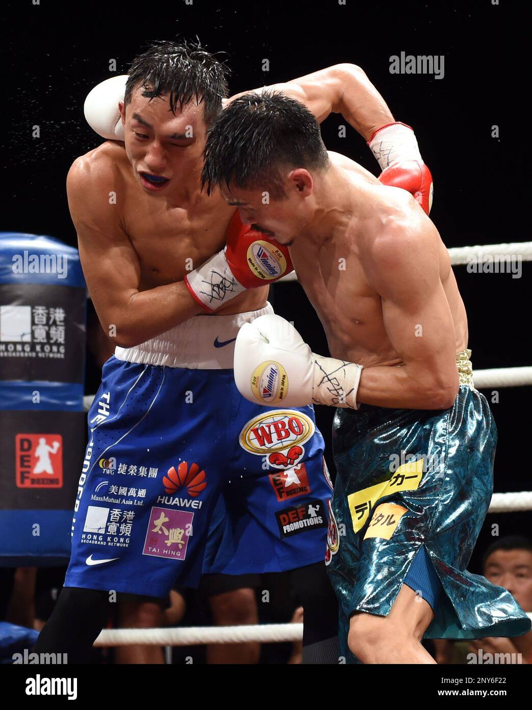 Rex Tso Sing-yu of Hong Kong, left, competes against Kohei Kono of ...