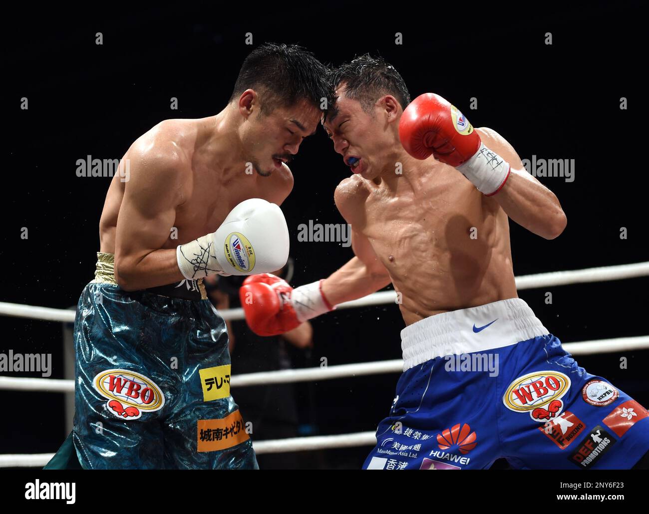 Rex Tso Sing-yu of Hong Kong, right, competes against Kohei Kono of ...