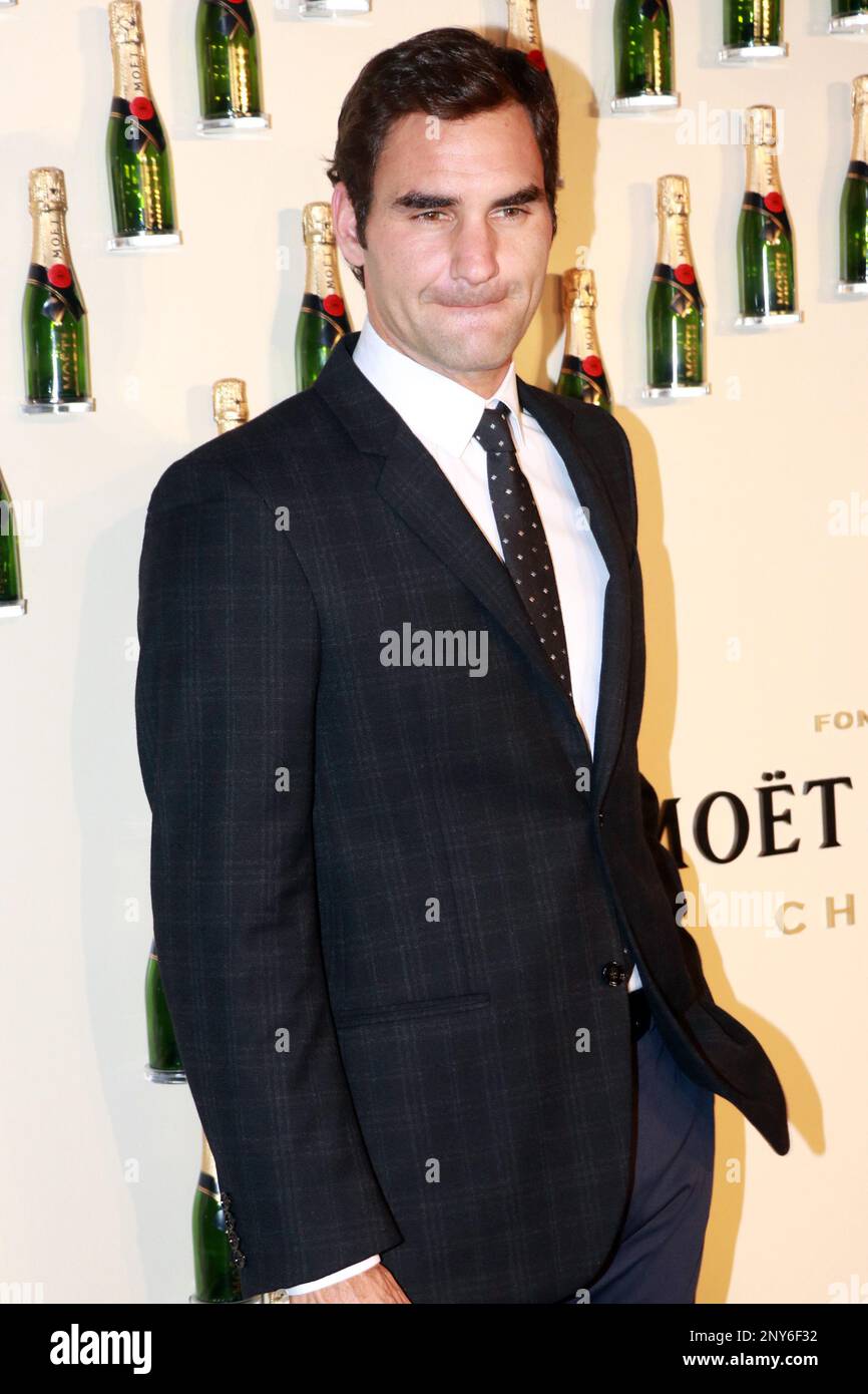 Swiss tennis player Roger Federer poses at the Moet and Chandon Party ...