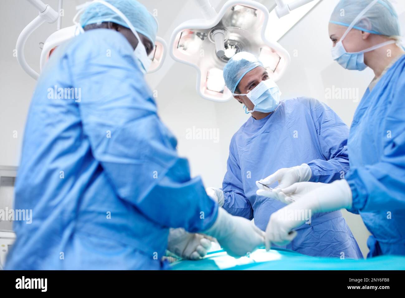 Two hands are better than one - Medical Team. A group of medical staff ...