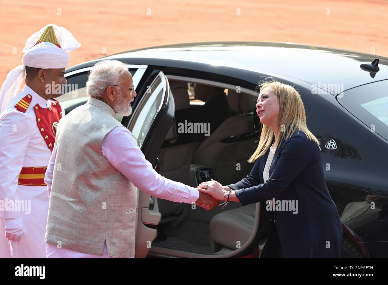 Italian Premier Giorgia Meloni, right, is received by Indian Prime ...