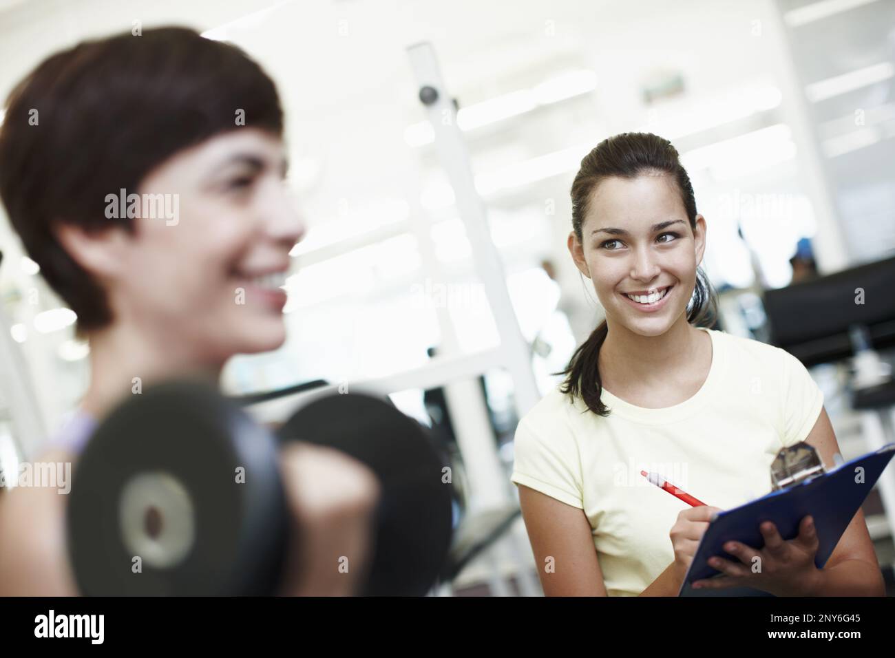 Youre making your trainer proud. an attractive young woman training on ...