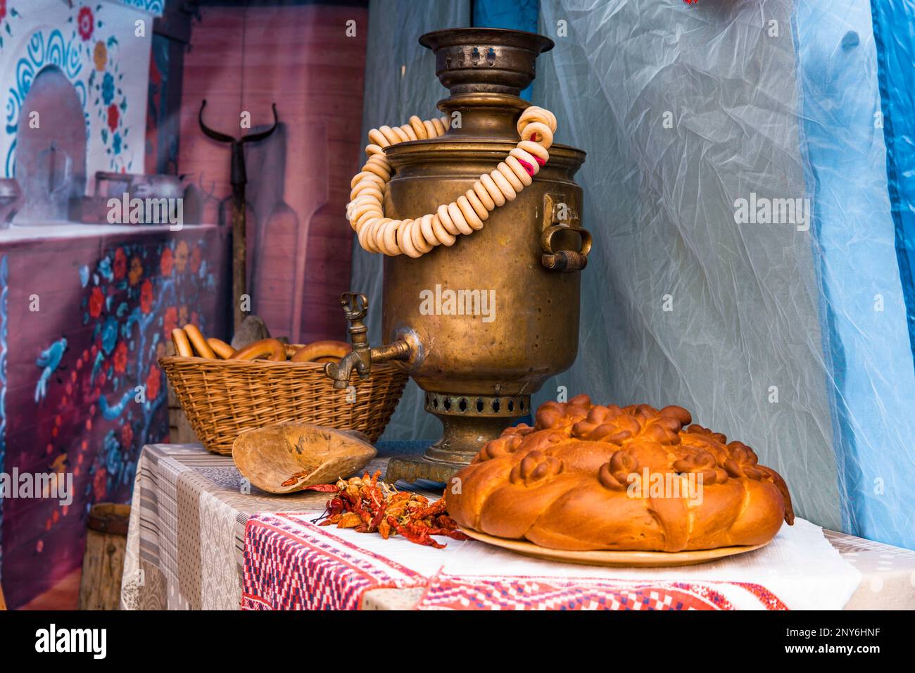 Russian traditional water boiler, bread on the table in a traditional ...