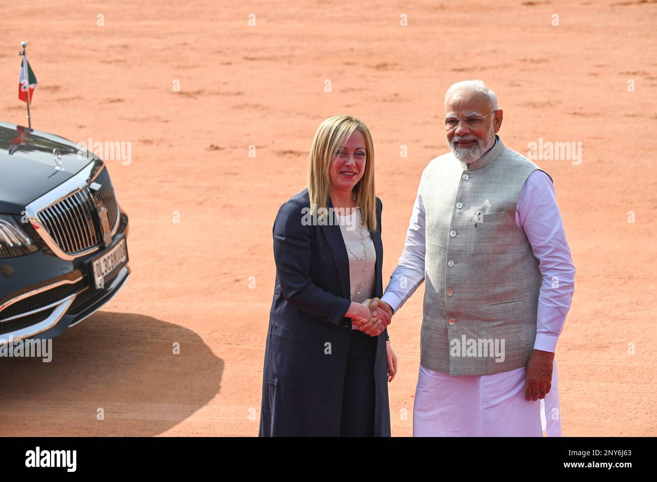 Italian Premier Giorgia Meloni, left, is received by Indian Prime ...