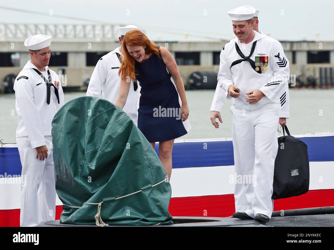 Ship Sponsor Elisabeth Mabus prepares to board the submarine after the ...