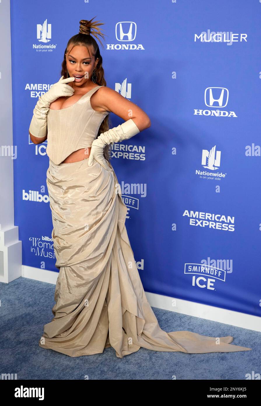 Honoree Latto poses at the 2023 Billboard Women in Music Awards ...