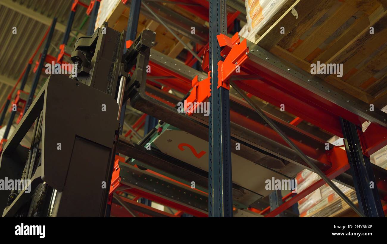 Poland, Warsaw- September 14, 2022: Unloading machine in warehouse ...