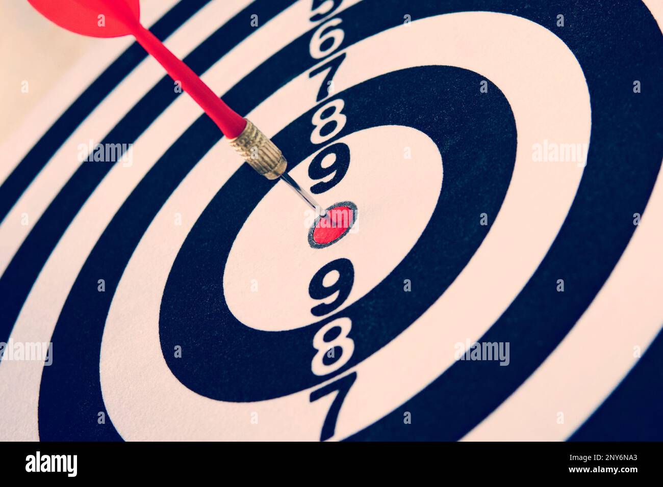 Dart hit target close-up. well-aimed hit. winning the competition ...