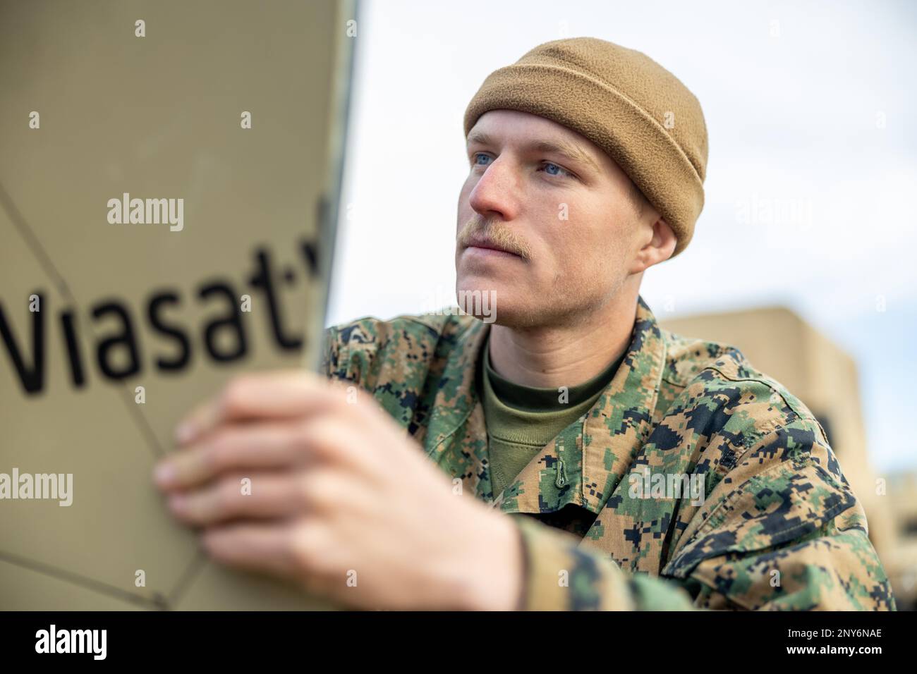 U.S. Marine Corps Lance Cpl. Dillon Stimson, a satellite communications ...