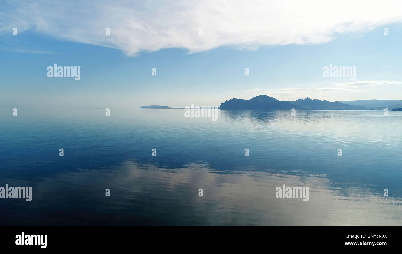 Landscape with clear mirror lake. Shot. Landscape in blue hues ...