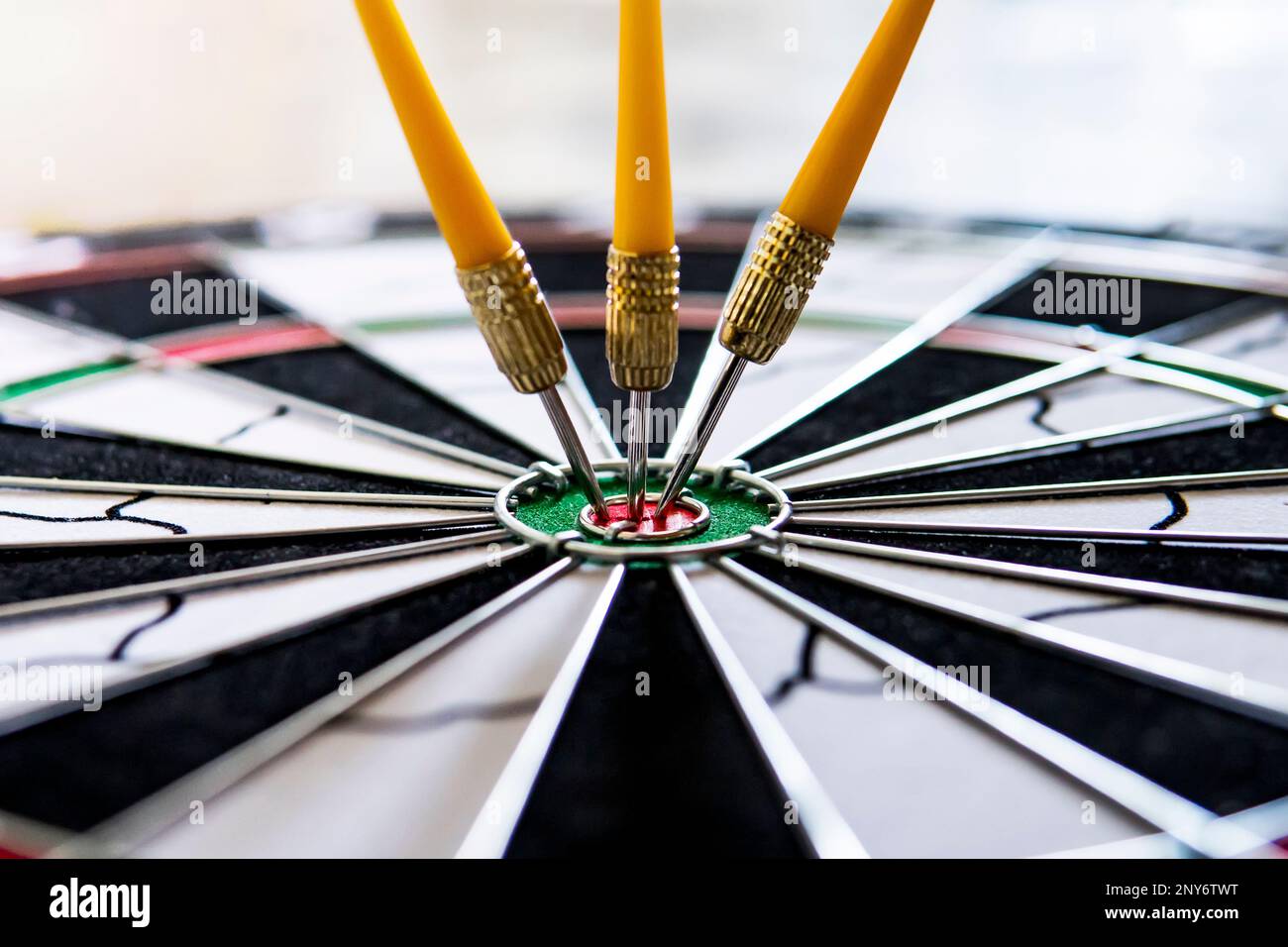 Dart hit target close-up. well-aimed hit. winning the competition ...