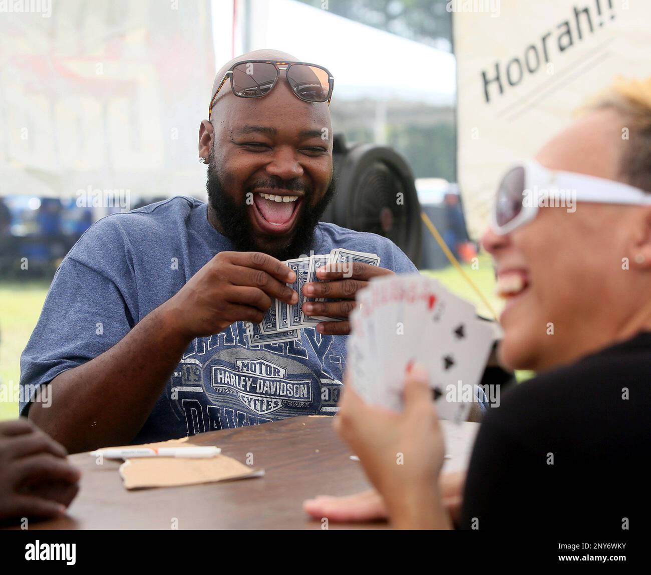 Clinton Whitaker, left, shares a laugh with Betsy Wilkins as they play ...