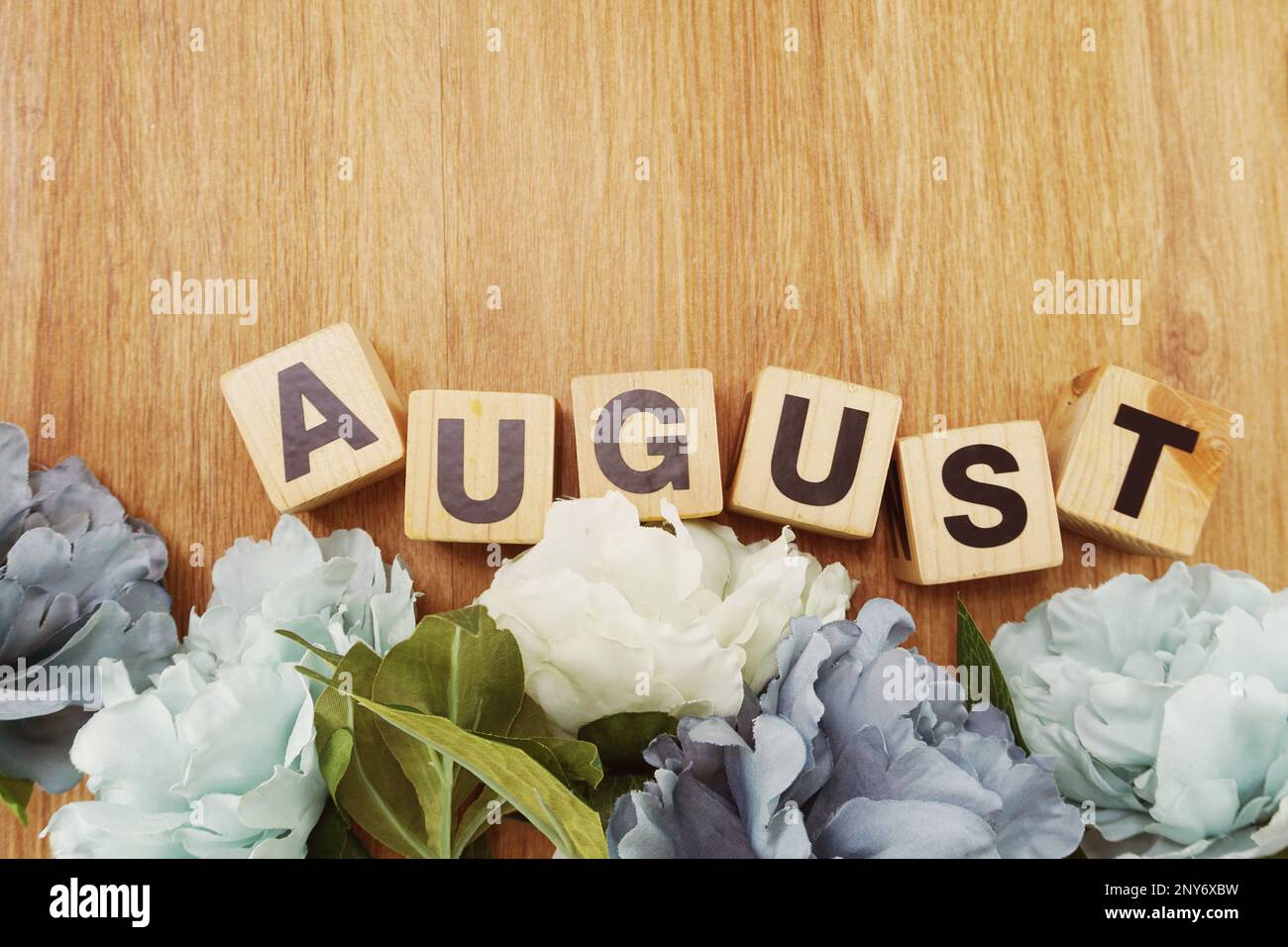 august alphabet letter wooden cube with space copy on wooden background ...