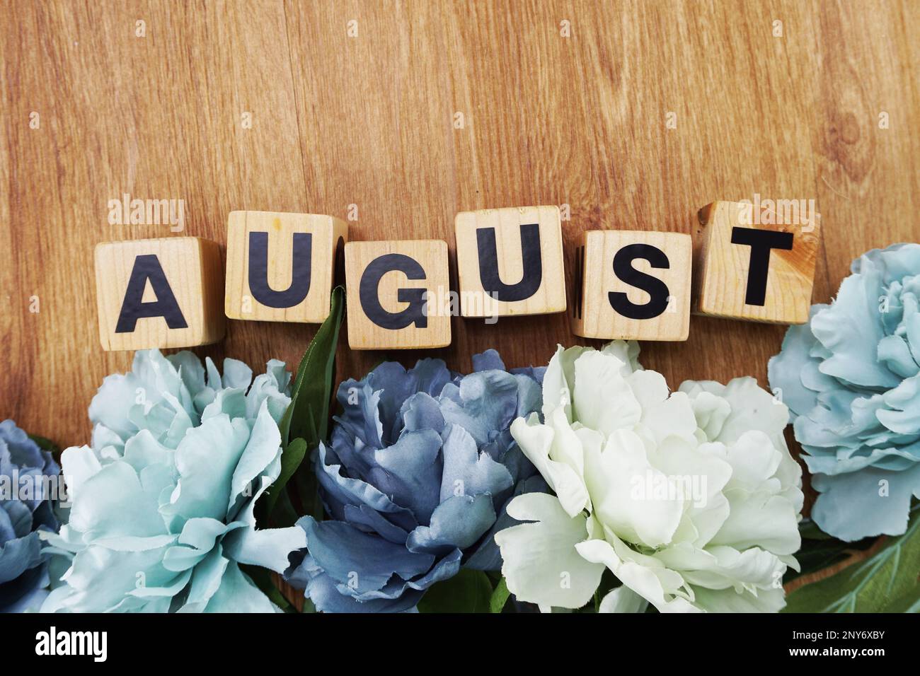 august alphabet letter wooden cube with space copy on wooden background ...