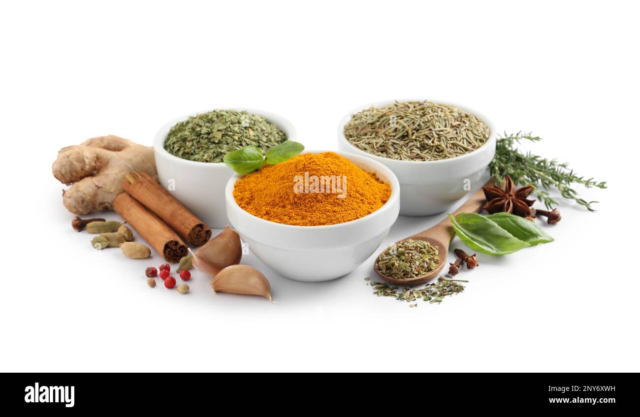 Different natural spices and herbs on white background Stock Photo - Alamy