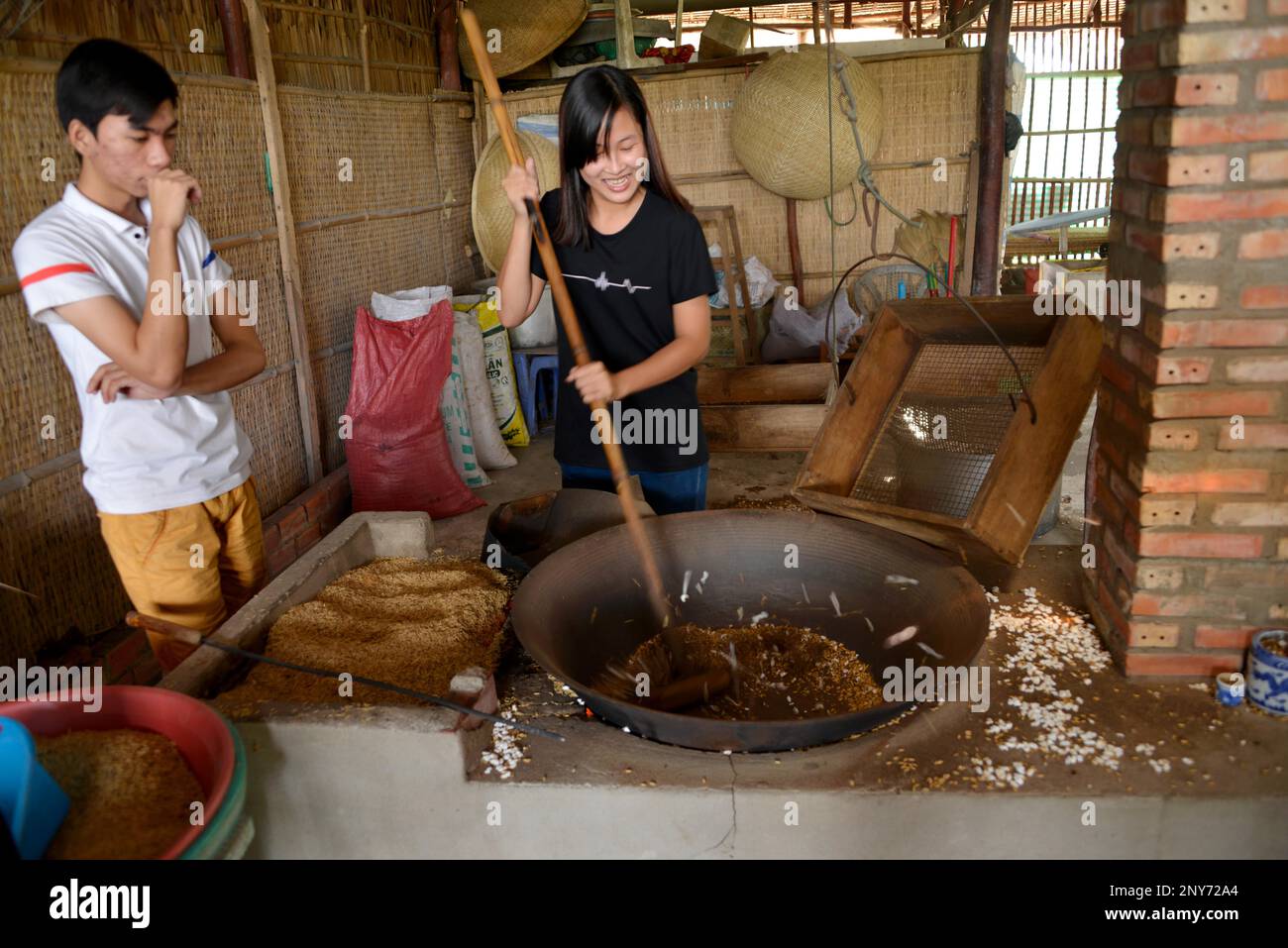 Show production, puffed rice, Mekong Delta, Vietnam Stock Photo - Alamy