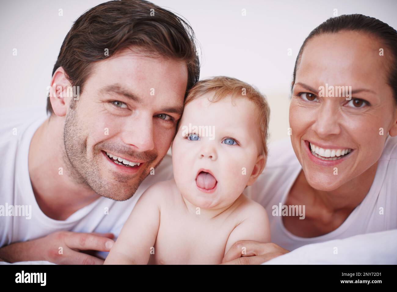 Our baby girl is simply the cutest. Portrait of two loving young ...