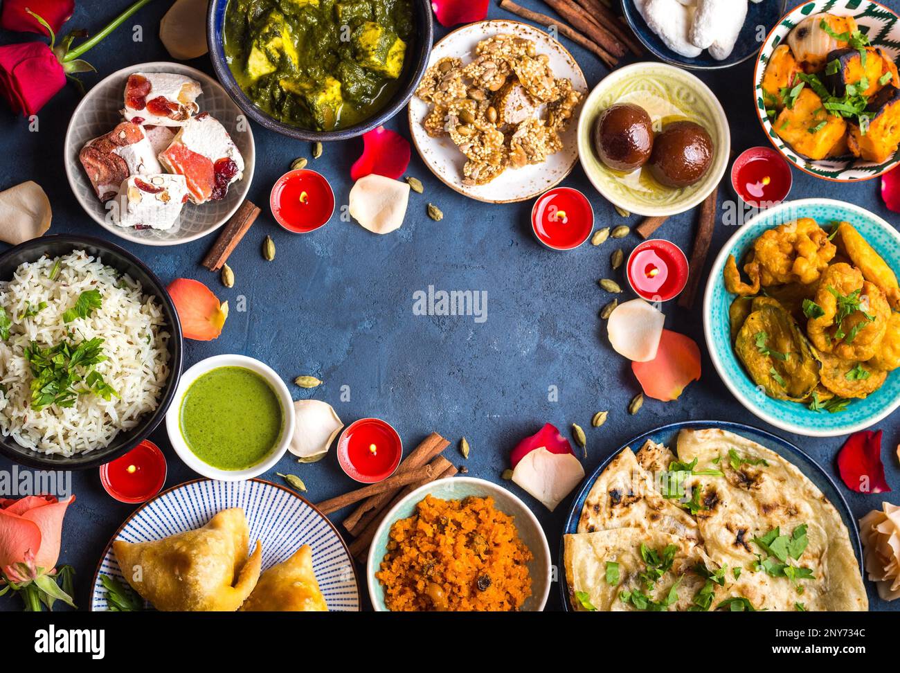 Festive food for Indian festival Diwali. Naan, samosa, rice, paneer ...