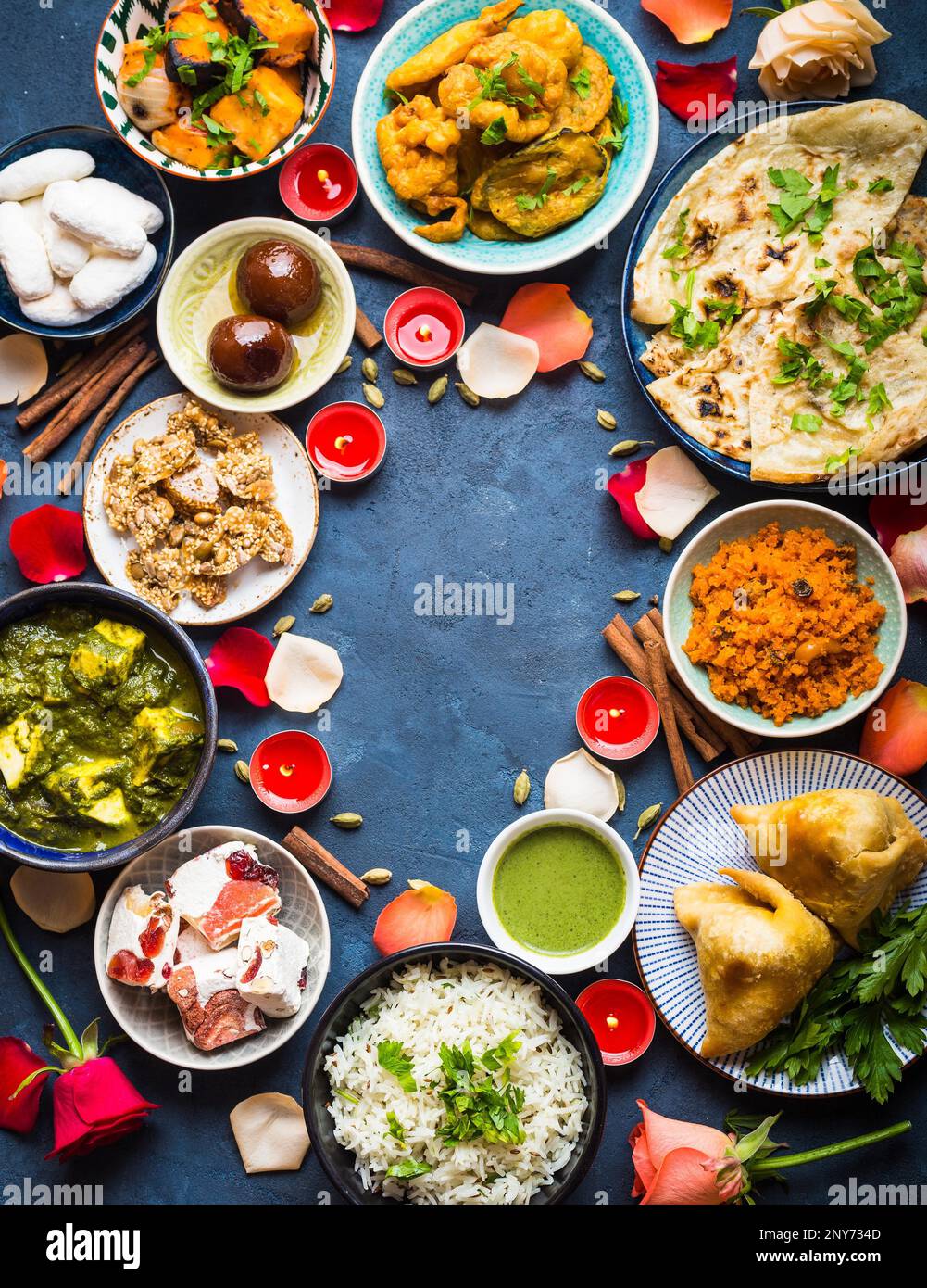 Festive food for Indian festival Diwali. Naan, samosa, rice, paneer ...
