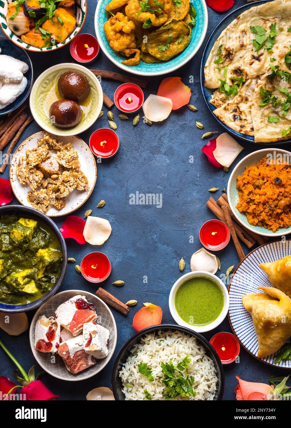 Festive food for Indian festival Diwali. Naan, samosa, rice, paneer ...