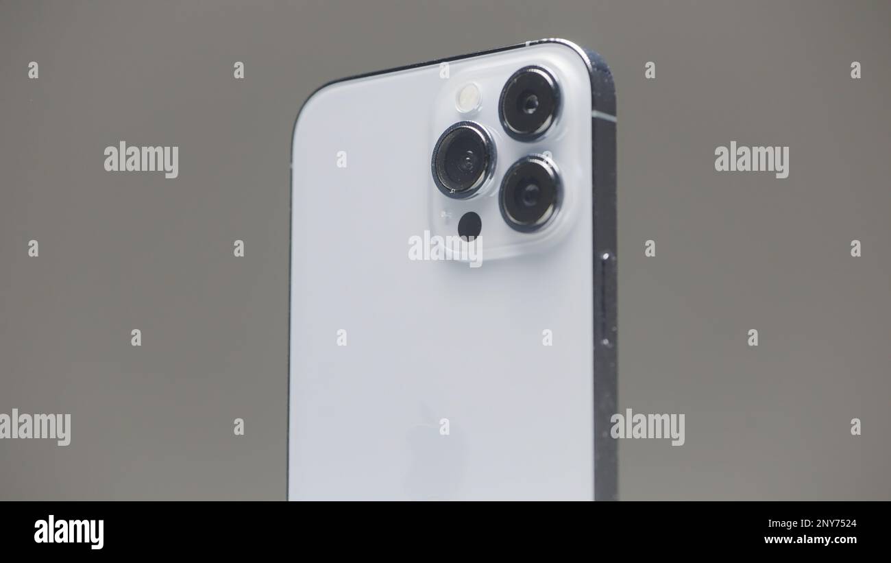 Germany - Berlin, September 27, 2022: New iPhone 13 pro rotating slowly ...