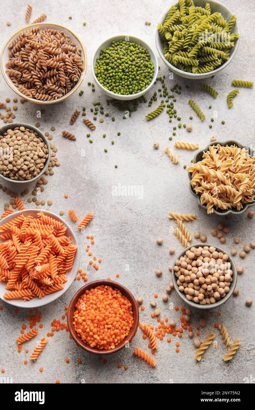 A variety of fusilli pasta made from different types of legumes, green ...