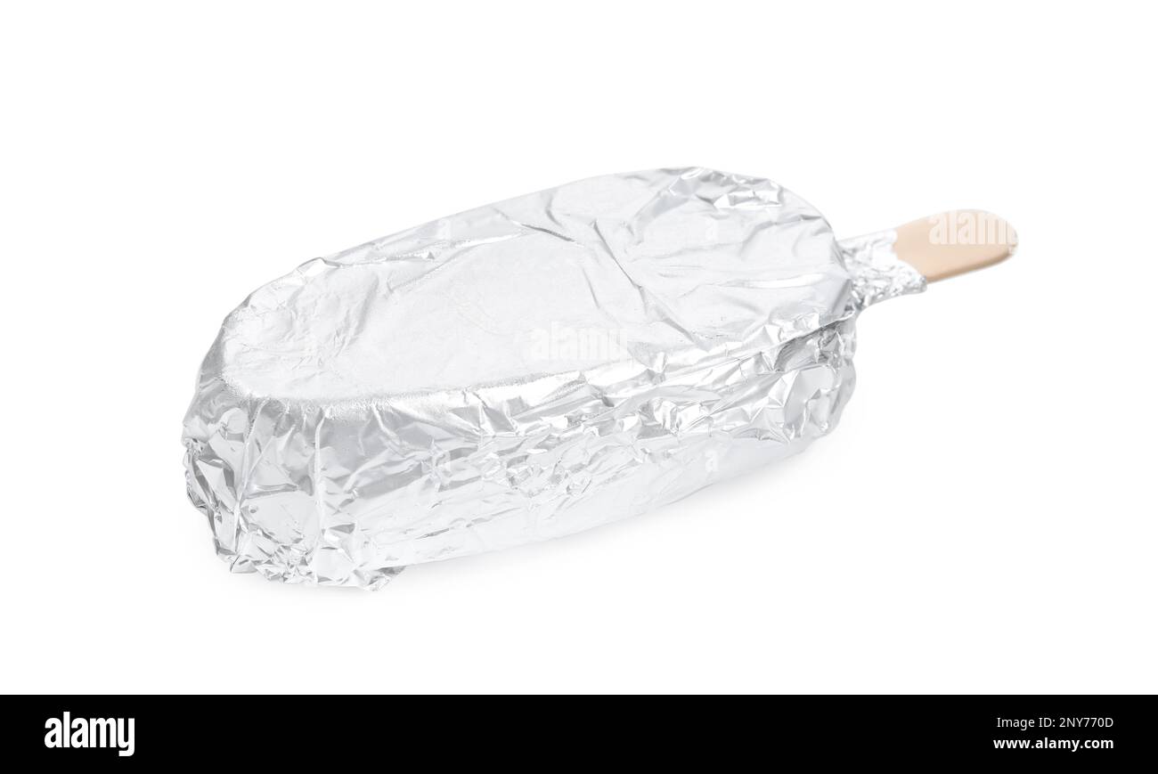 Ice cream bar wrapped in foil on white background Stock Photo - Alamy