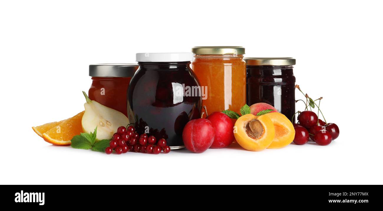 Jars with different jams and fresh fruits on white background Stock ...