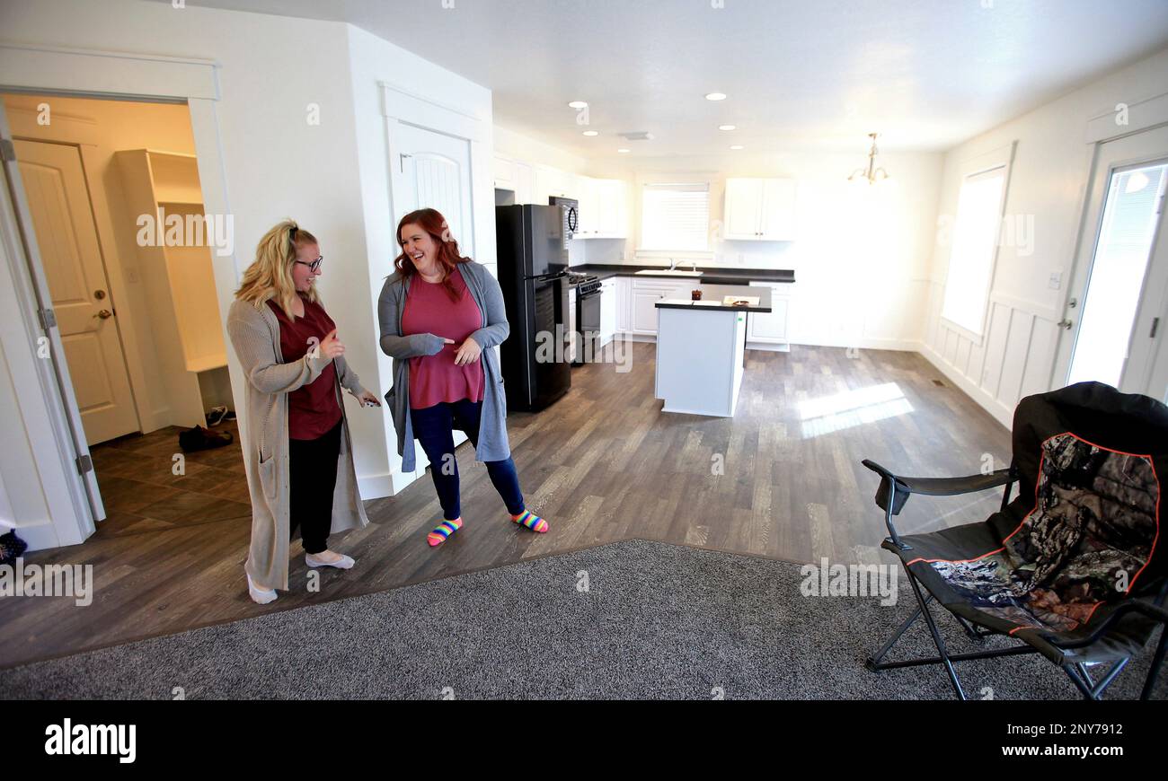 In this Sept. 2017, photo, Loryn Law, right, laughs with Mikell Brown ...