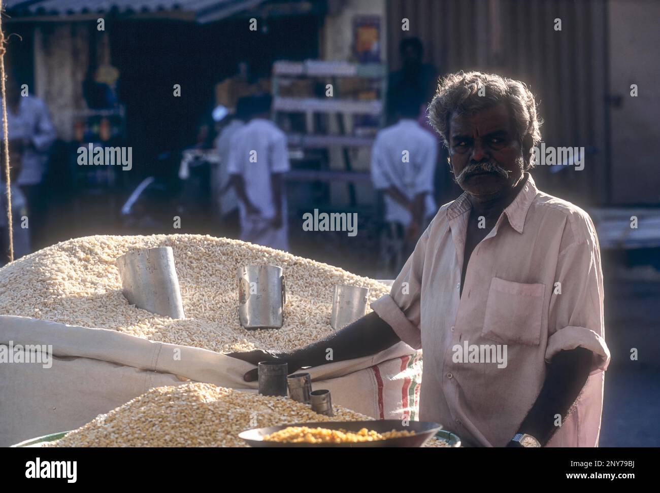 A man selling puffed rice in the market Tamil Nadu, India Stock Photo ...