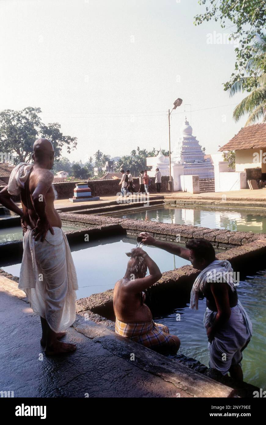 A ritual being performed at Kashi Bhageerathi theertha in Kadri ...
