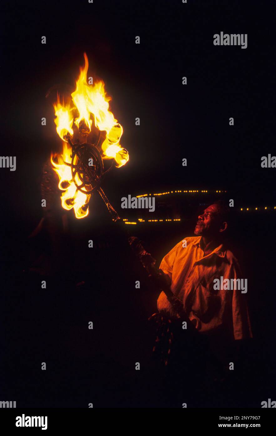 Holding fire torch in Pooram festival at Thrissur Trichur, Kerala ...